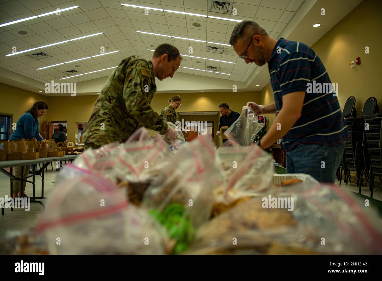 Team Charleston volunteers sort cookies during Operation Cookie Drop at ...