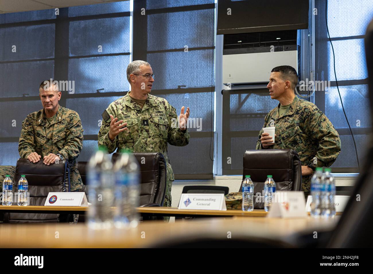 U.S. Navy Rear Adm. James Kirk, center, the commander of Expeditionary ...