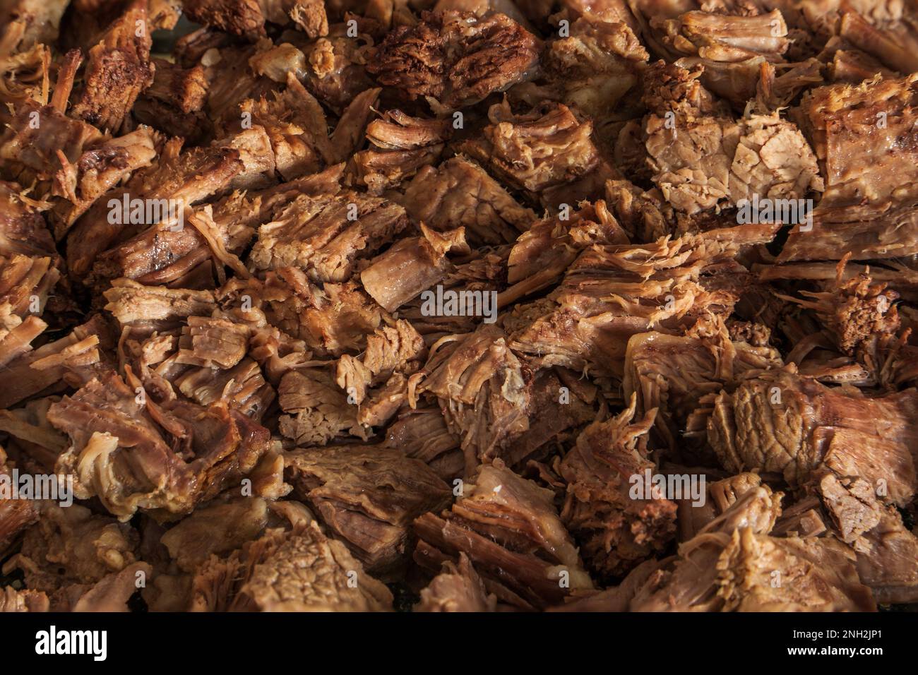 Tender braised beef meat close up, background Stock Photo - Alamy