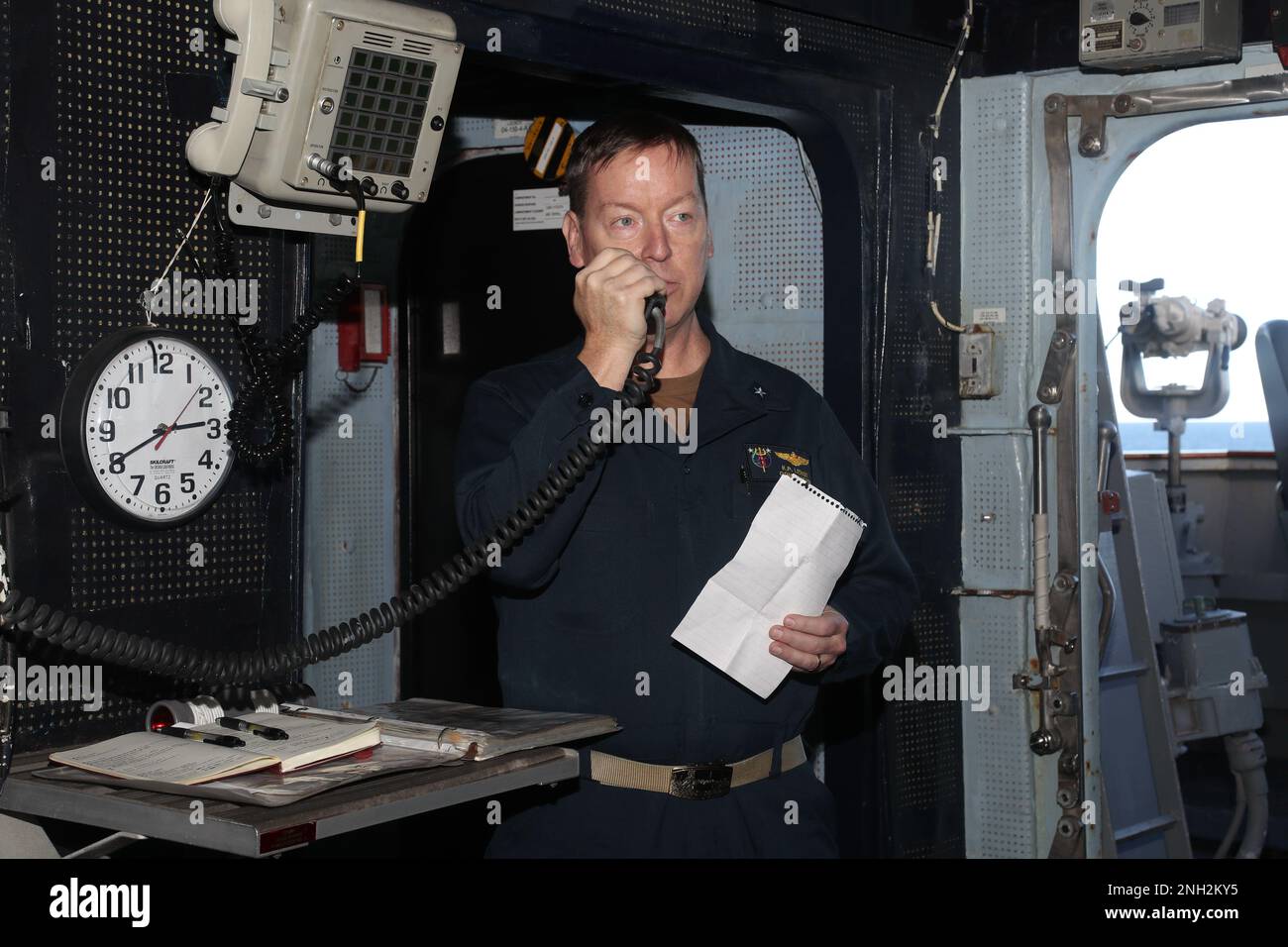 Rear Adm. Kevin Lenox, commander, Carrier Strike Group (CSG) 3, address ...