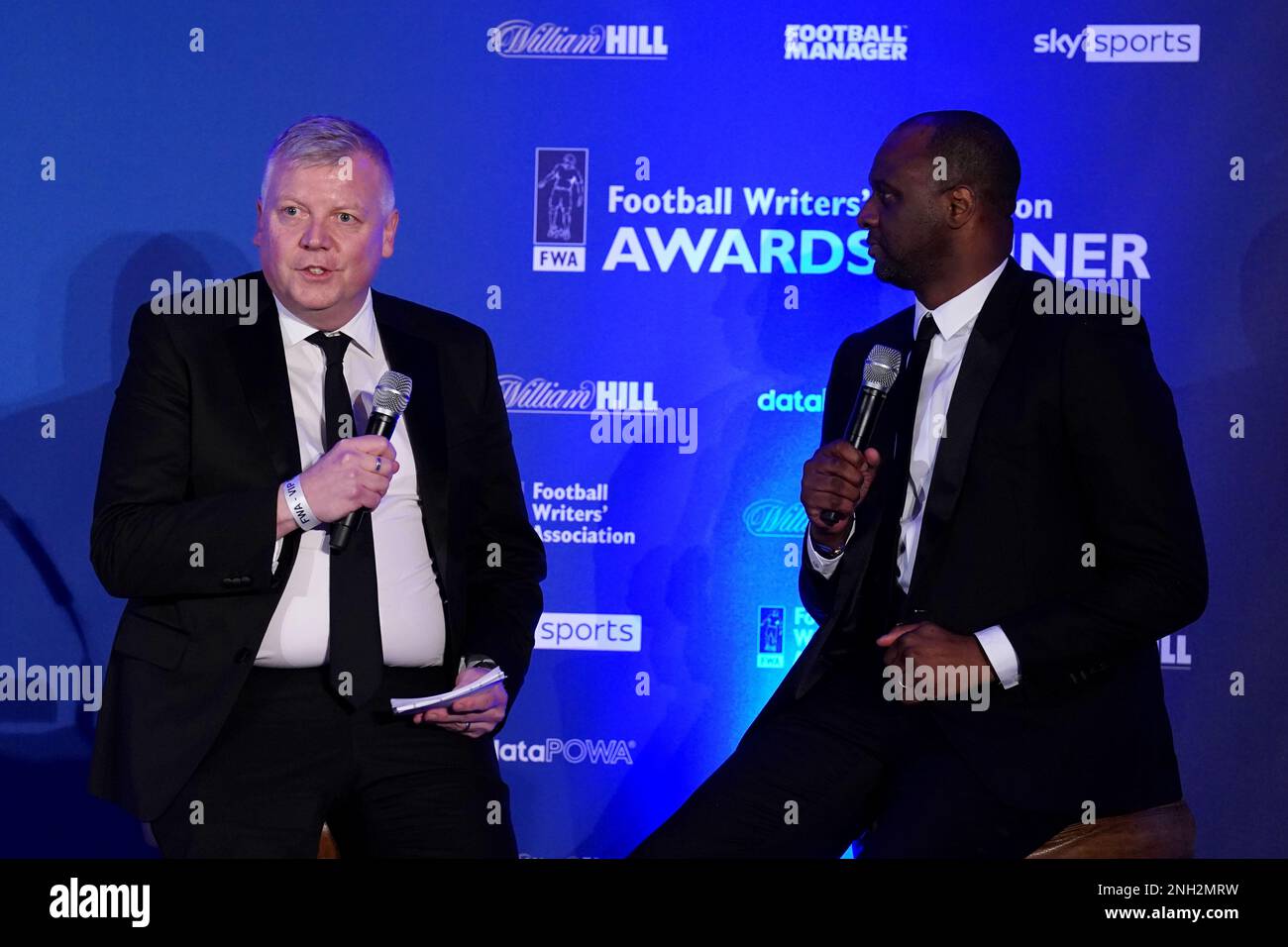 John Cross, chairman of the FWA talks to Patrick Vieira (right) during ...