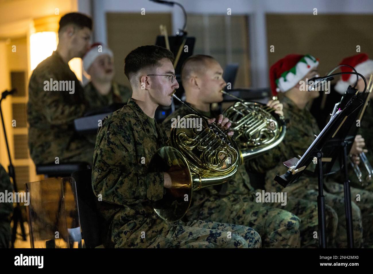 U.S. Marine Corps Cpl. Ethan Dotson, a Midland, Michigan native and a french horn ...