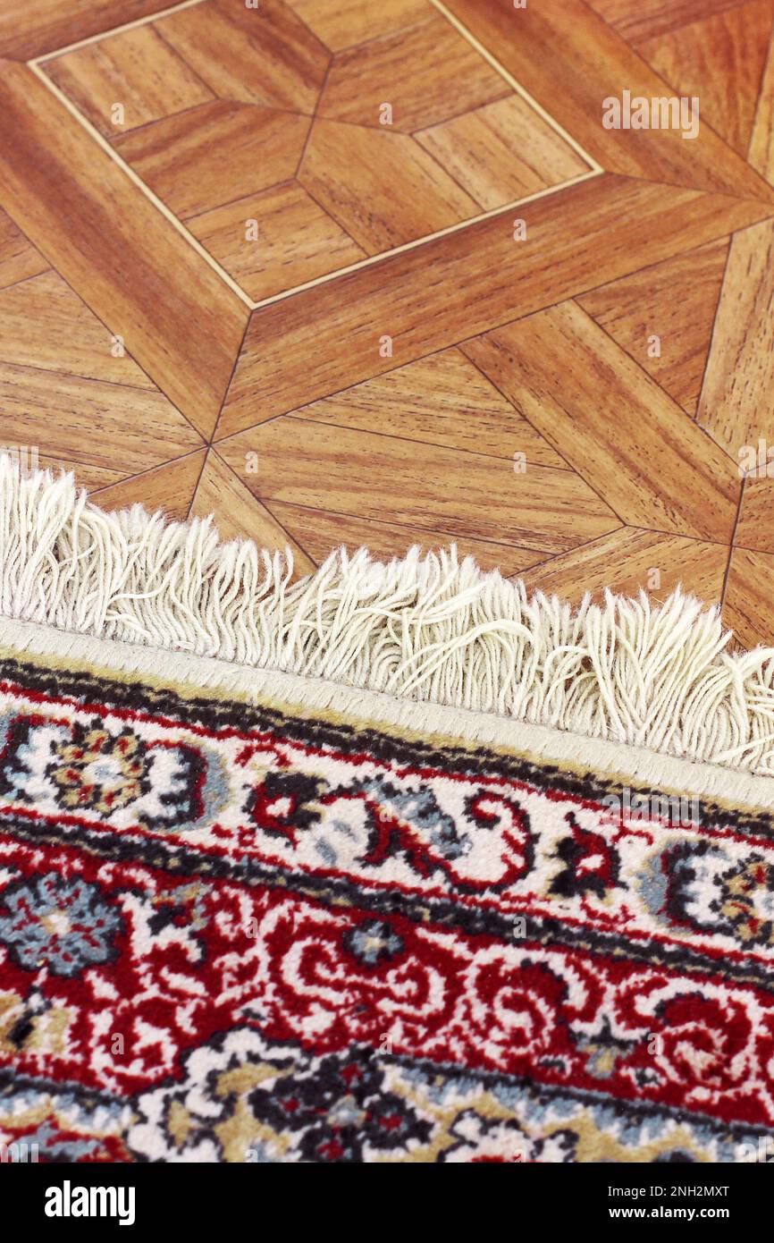 A beautiful carpet on the floor Stock Photo - Alamy