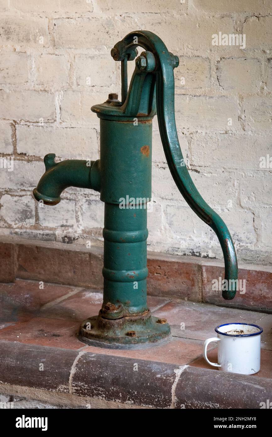 Vintage water pump in an old wash house Stock Photo - Alamy