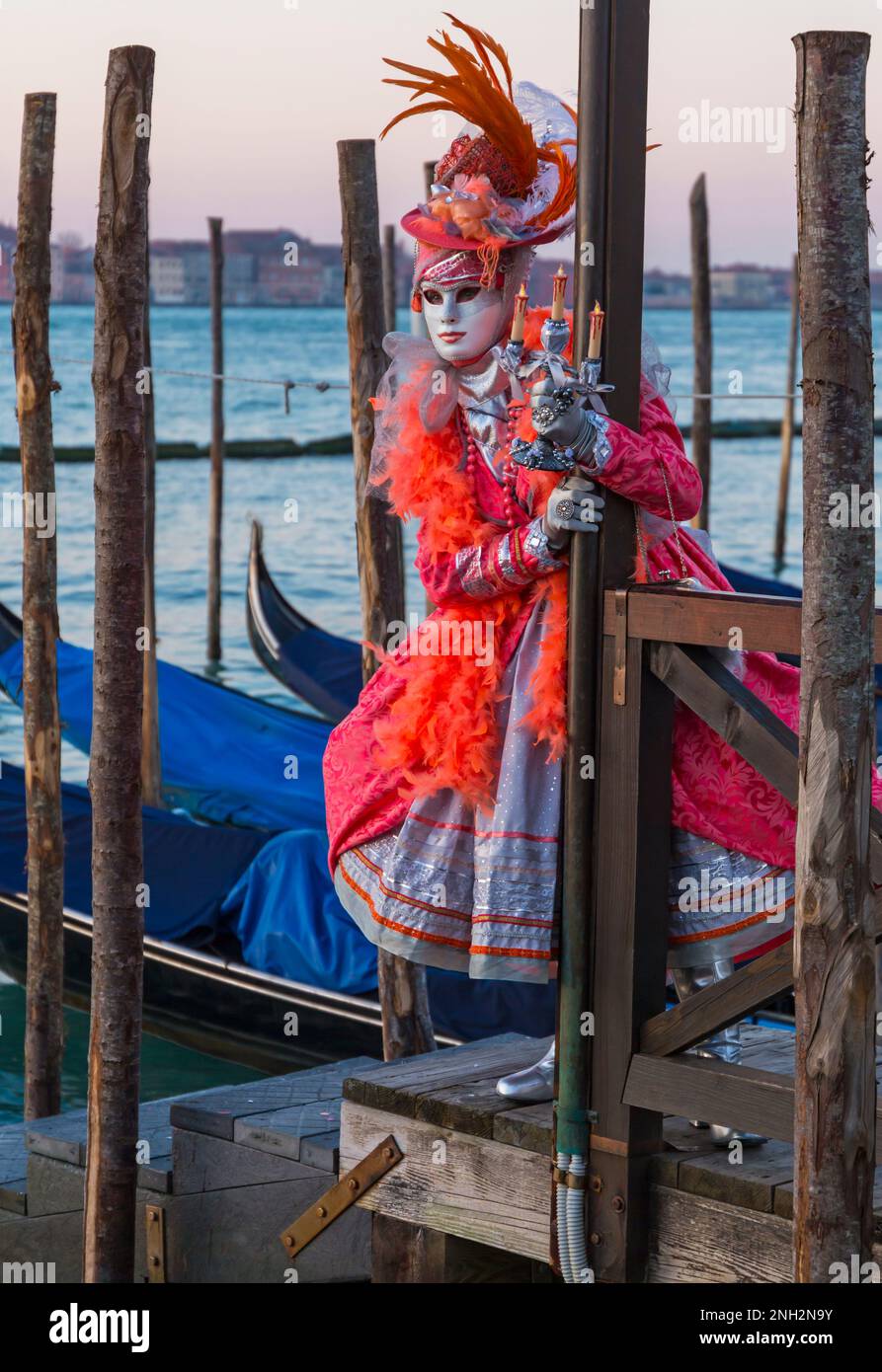 Carnival goer dressed in splendid costume and mask during Venice ...