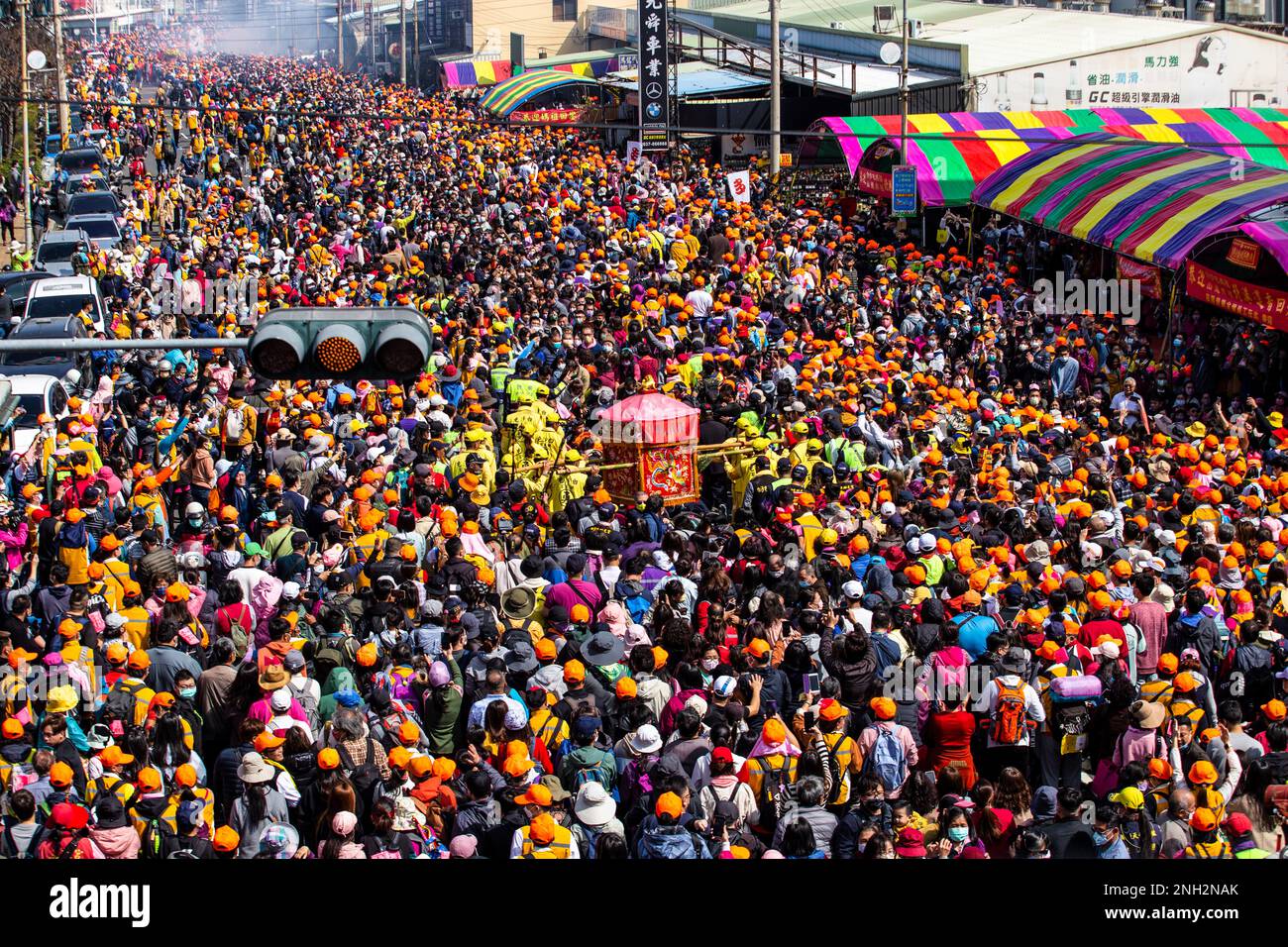 Pilgrims crowd the street in Baishatun Matsu Pilgrimage Mission in ...