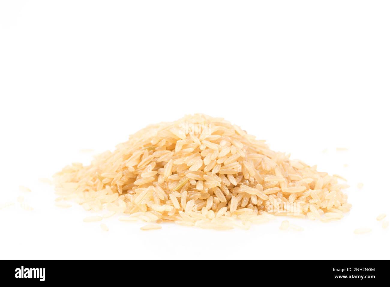 Pile of Brown Rice Isolated on a White Background Stock Photo - Alamy