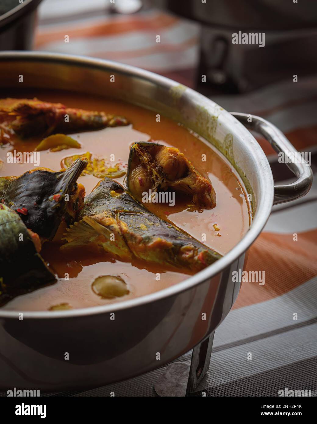 Ikan Patin Masak Tempoyak in stainless steel pot. Patin Tempoyak fish ...