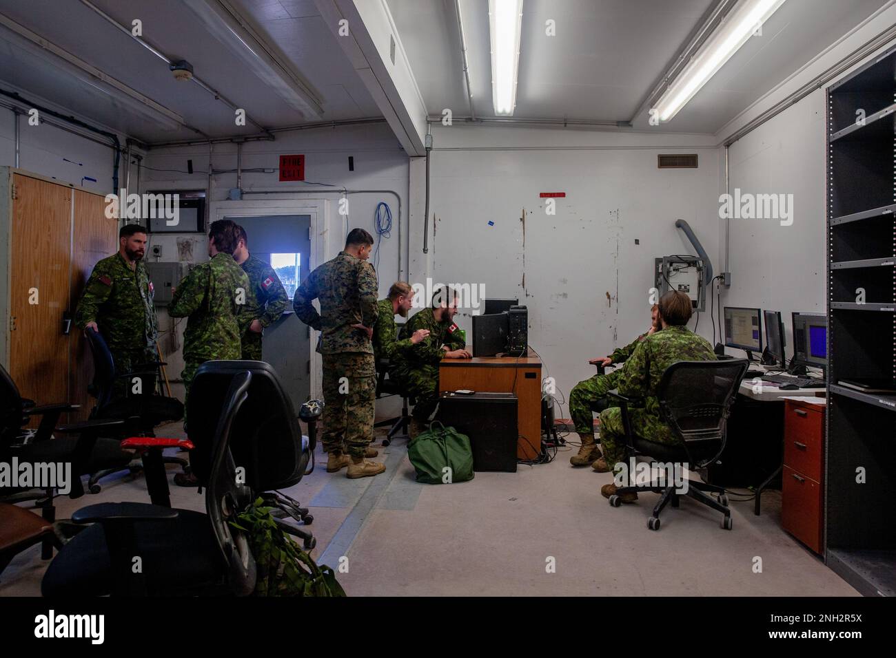 U.S. Marine Corps Capt. Daniel Renner (center), a pilot with Marine ...