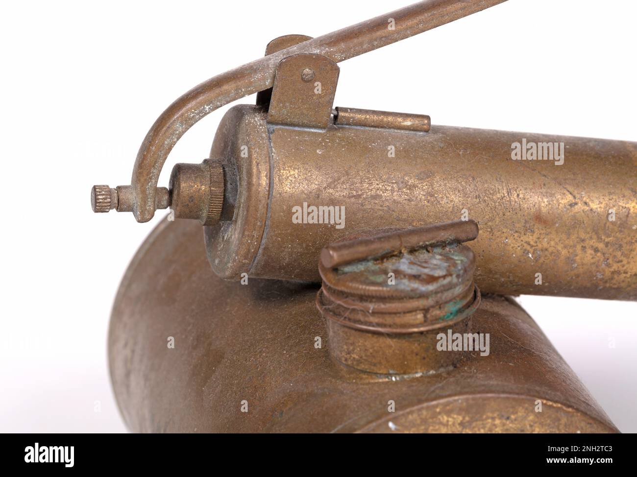 Old brass insecticide spray on a white background Stock Photo - Alamy