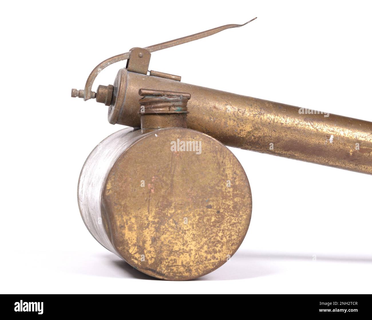 Old brass insecticide spray on a white background Stock Photo - Alamy
