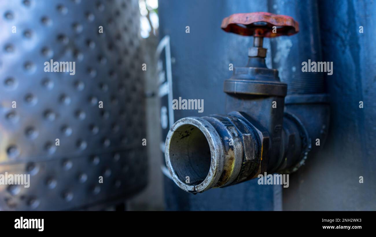 Waste release pipe at an oil recycling plant Stock Photo - Alamy