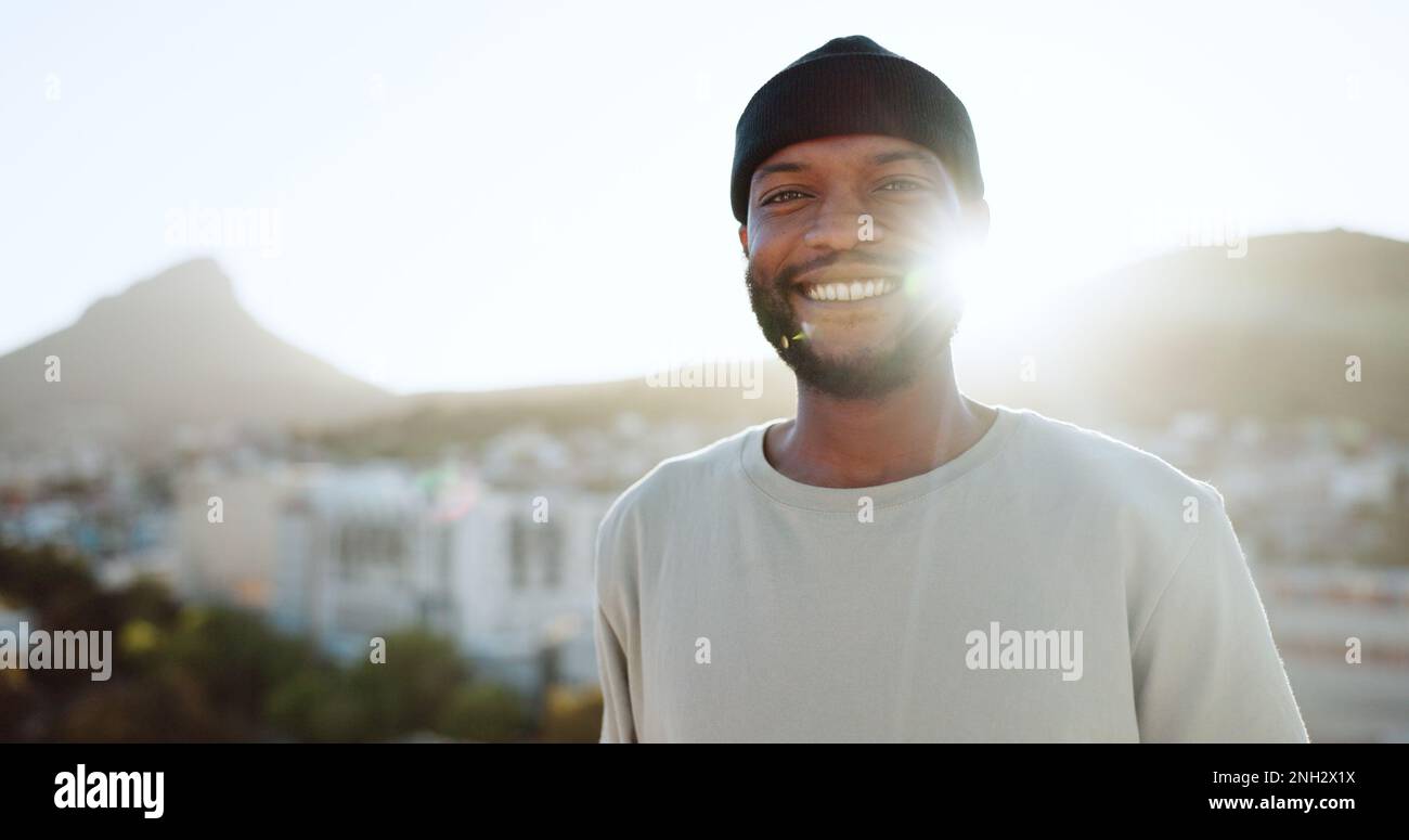 Face, happy and street style with a black man outdoor in the city with ...