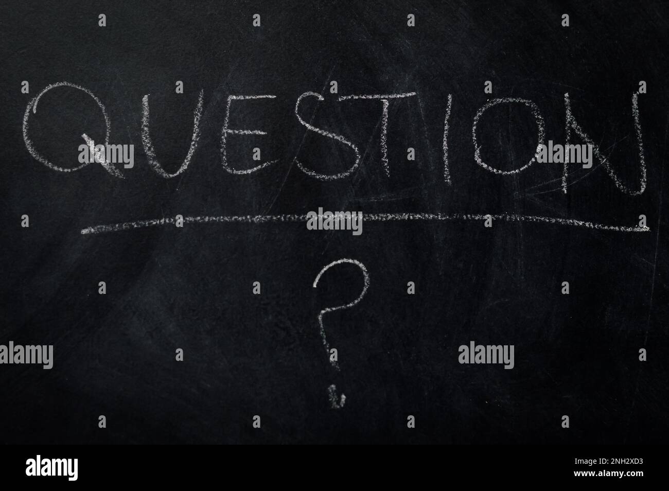 Do you have any questions? the word question handwritten with chalk on ...