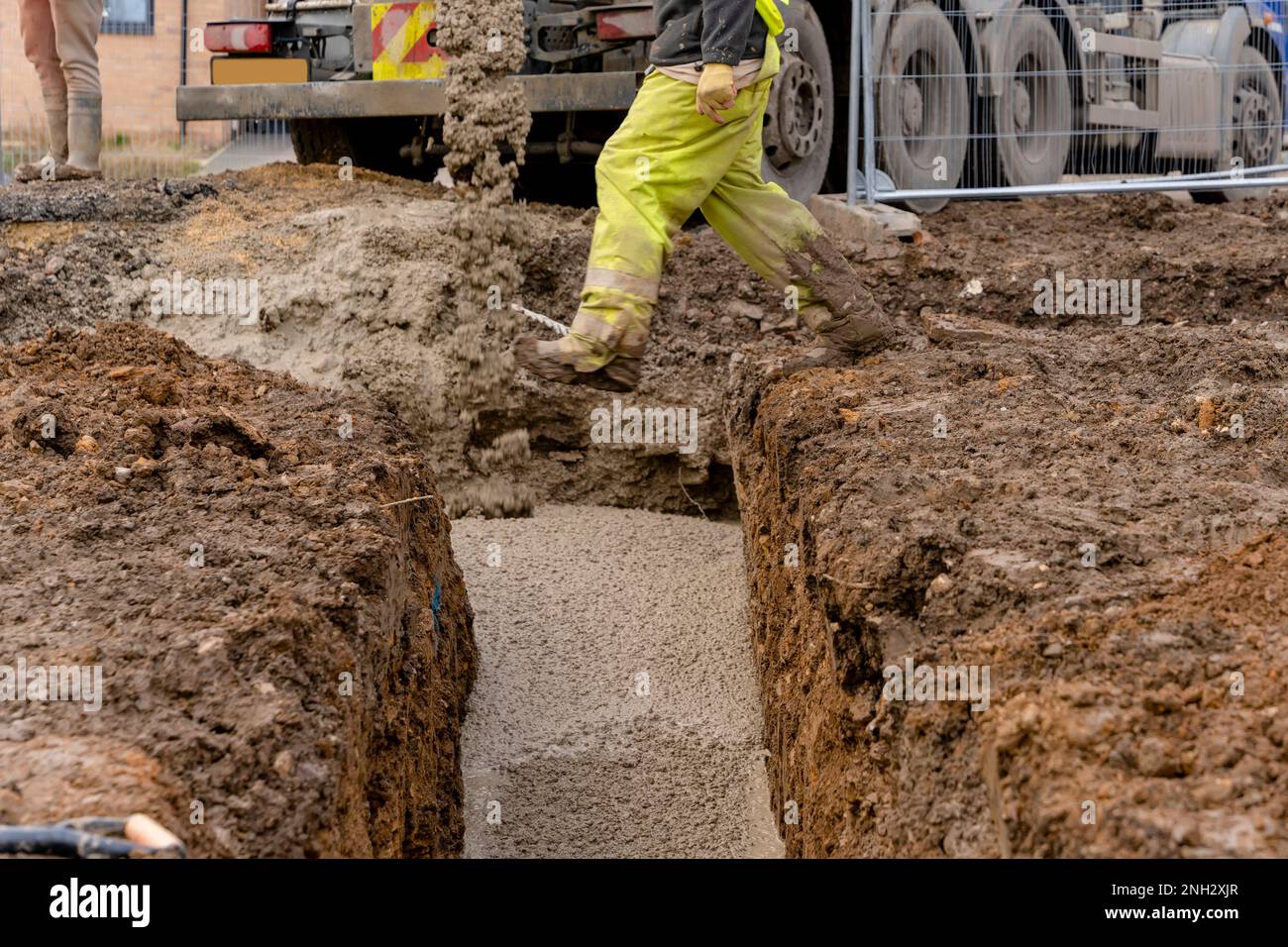 Ready-mix semi-dry concrete delivered on construction site and ...