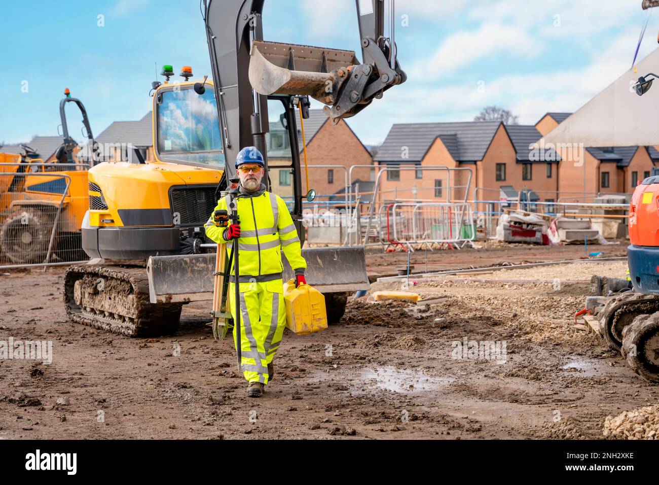 Surveyor builder site engineer with theodolite total station at ...