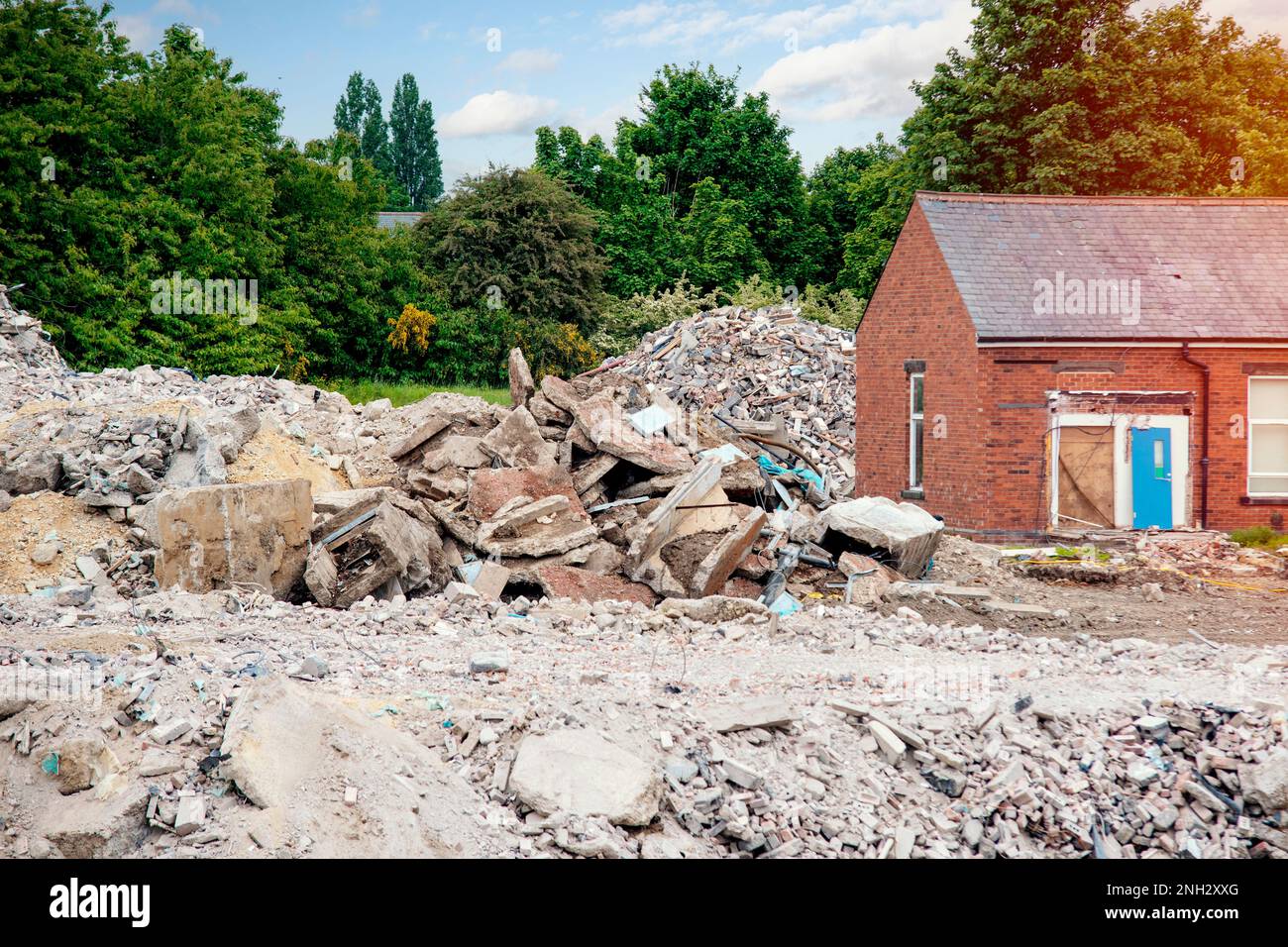 Demolition of building. Excavator breaks old house. Making space for ...