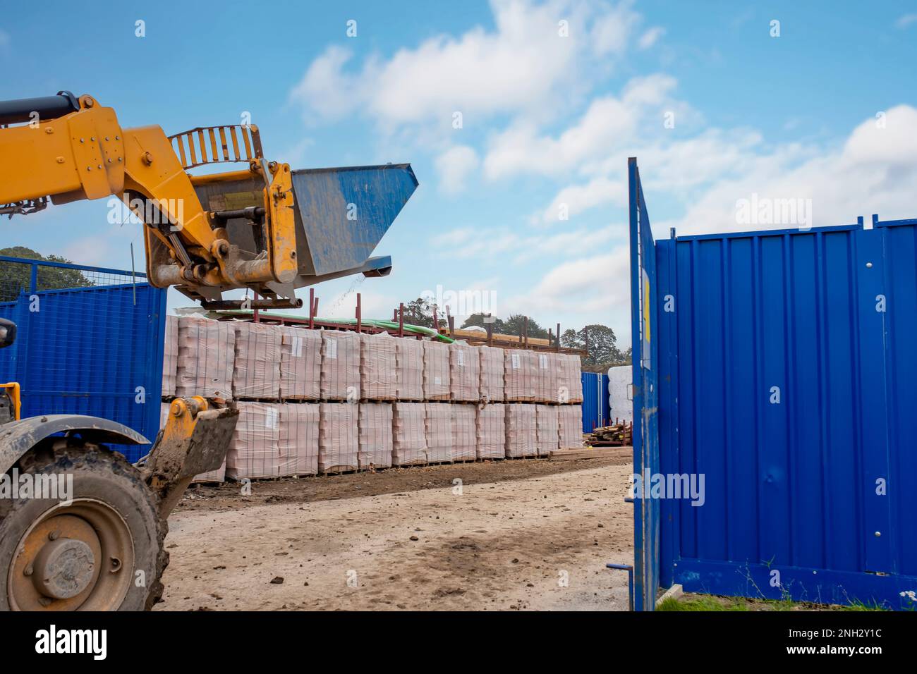 Blue dumpster auto self tipping skip with auto-lock moved by ...
