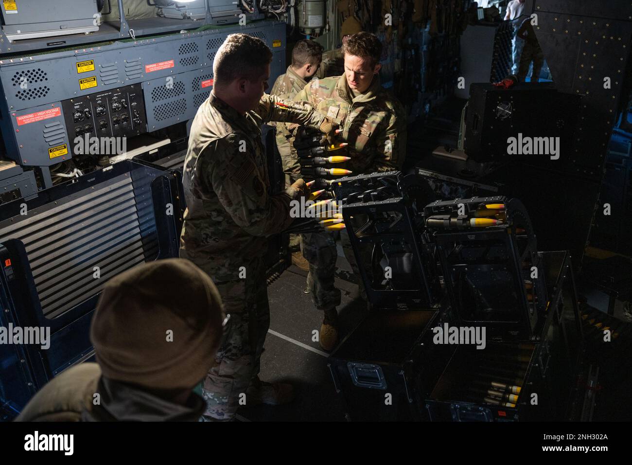 U.S Air Force weapons load crew and Airmen of the 27th Special ...
