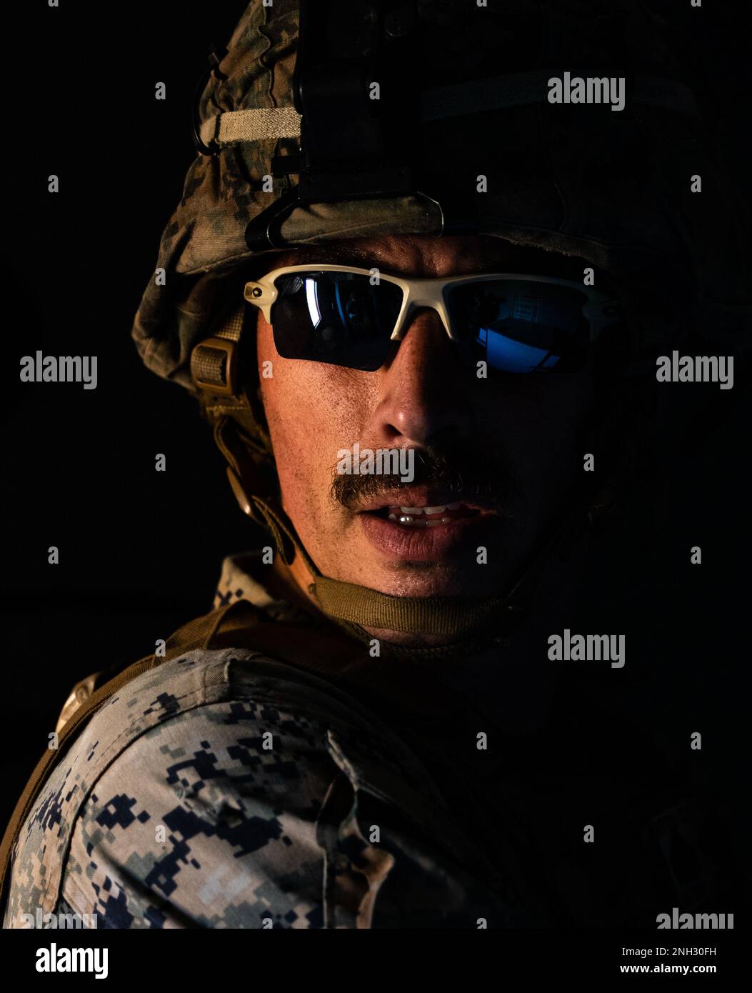 U.S. Marine Corps Sgt. Diego Walker, a combat engineer with Marine Wing ...