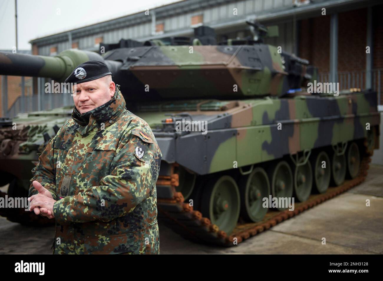 Lieutenant colonel and tank instructor Peter ist standing in front of a ...