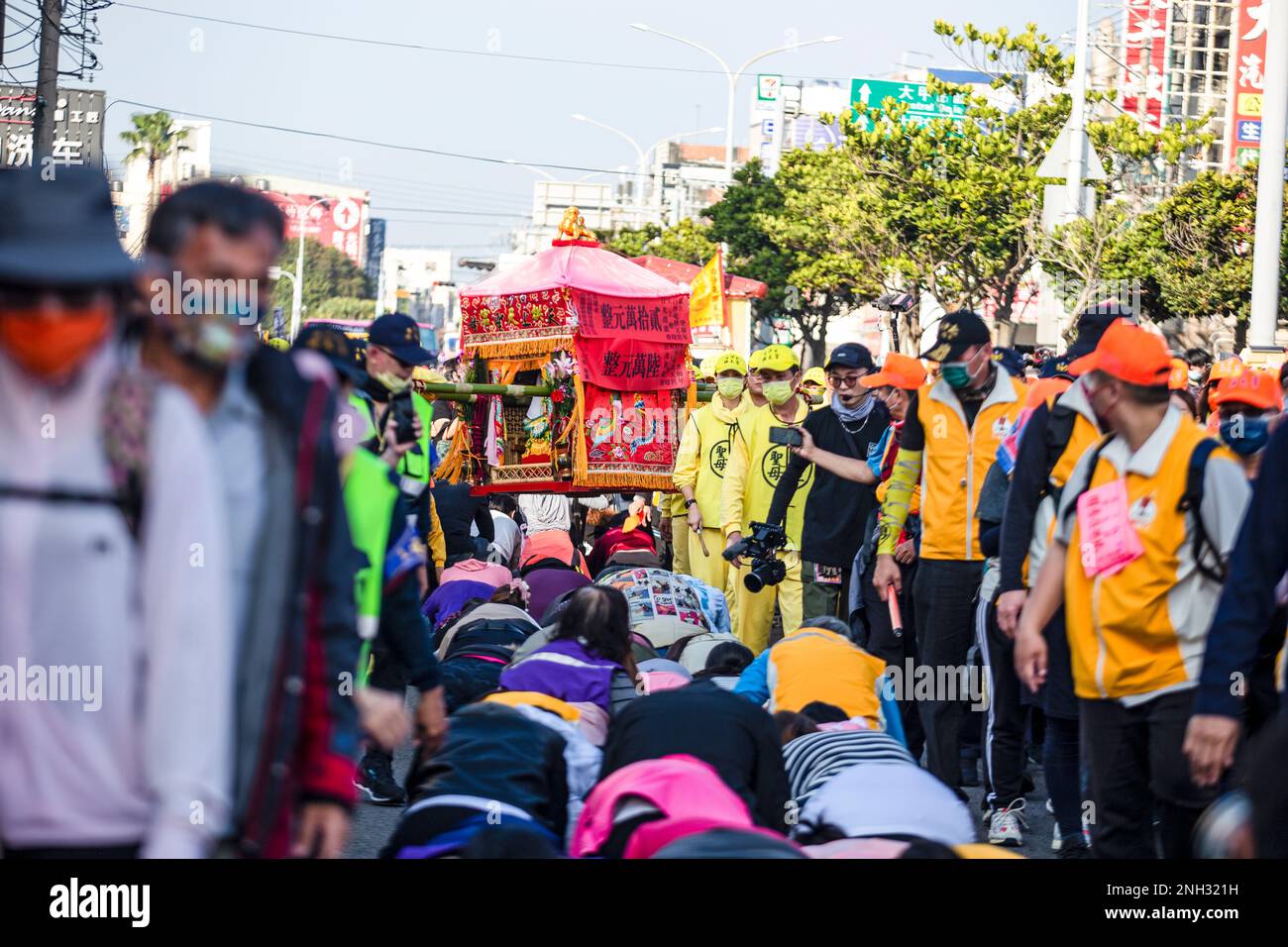 During the Baishatun Mazu Pilgrimage in Taiwan, lots of pilgrims would ...