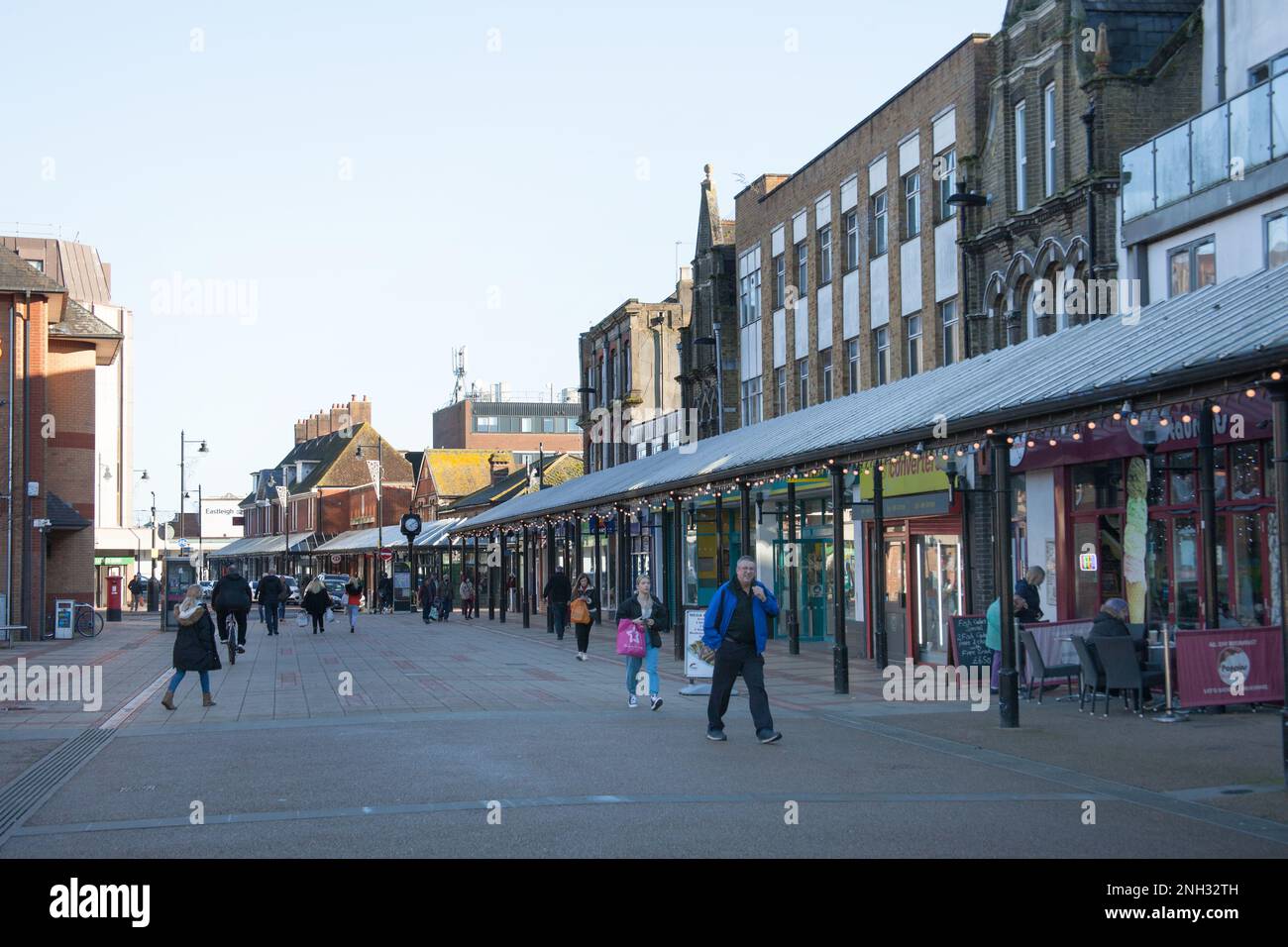 Shoppers walk down the High Street in Eastleigh in Hampshire in the UK ...