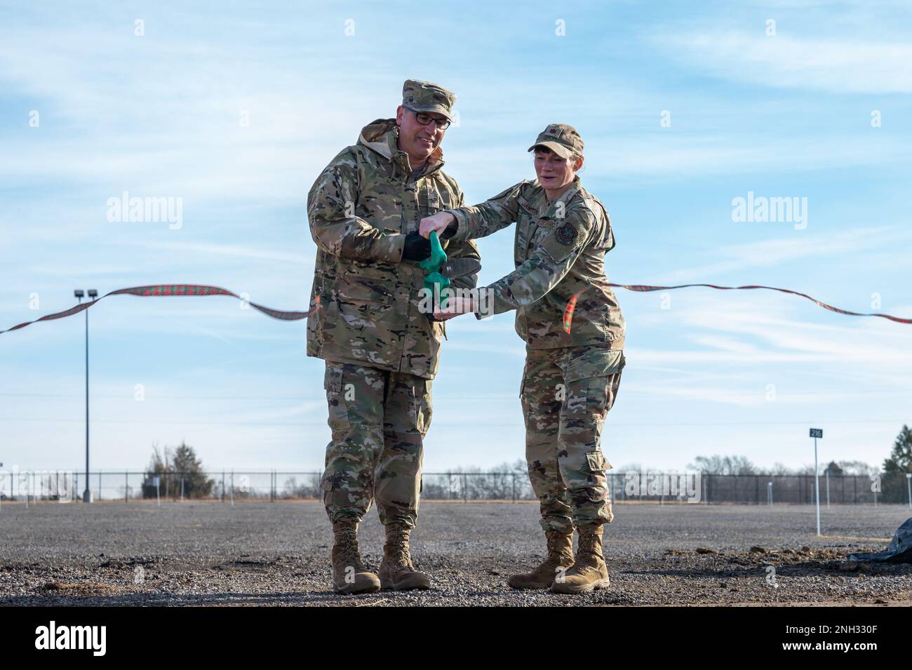 Colonel Nate Vogel, 22nd Air Refueling Wing commander, and Maj. Melissa ...