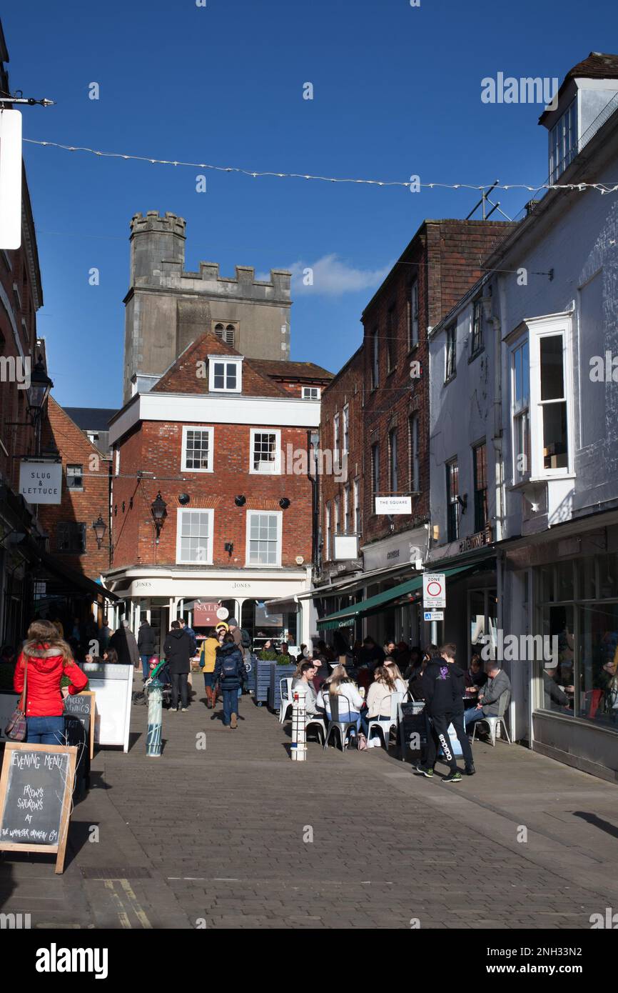 Shoppers in the busy town centre in Winchester during the winter in ...