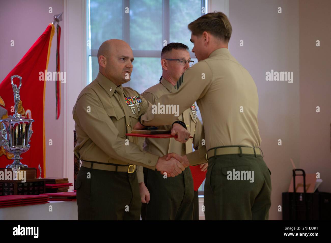 U.S. Marine Corps Chief Warrant Officer five Ronald C. Hathaway, left ...