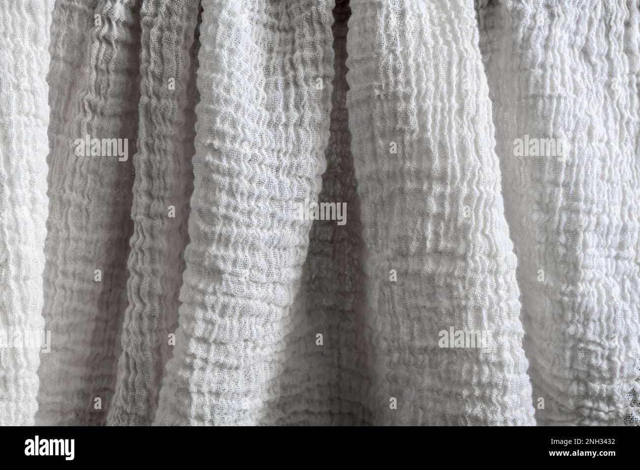 Close shot of cotton cheesecloth material - fabric washed & dried but ...