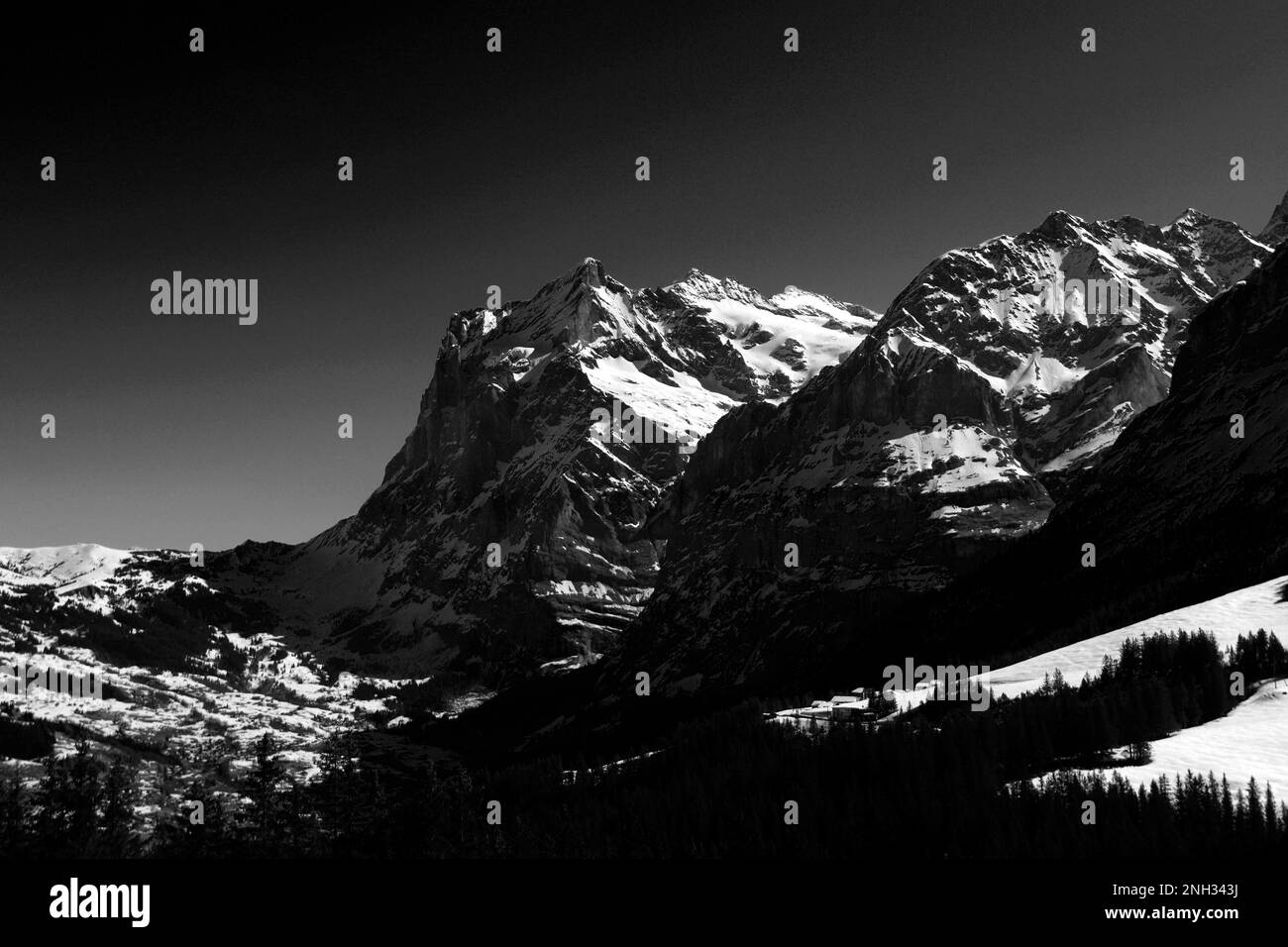 Winter snow view over the Wetterhorn mountain, Grindelwald Ski resort ...