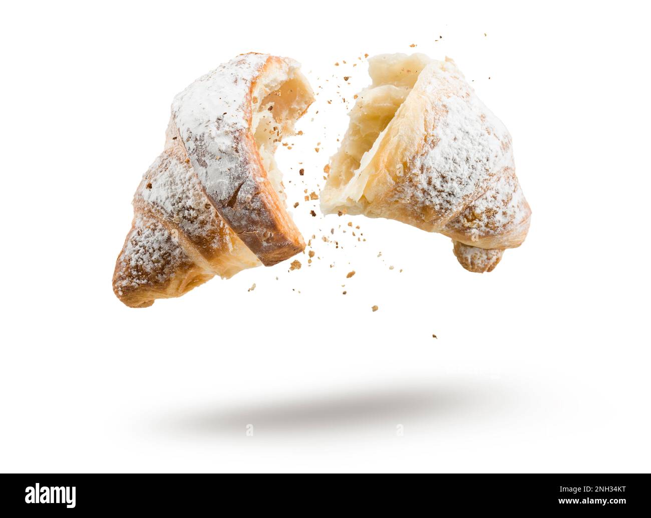 Croissant with sugar open in half floating on white background Stock ...