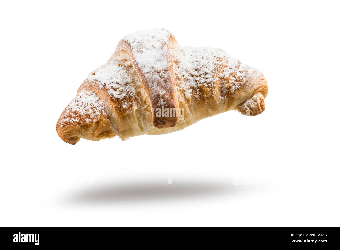 Fresh croissant with sugar floating on white background Stock Photo - Alamy