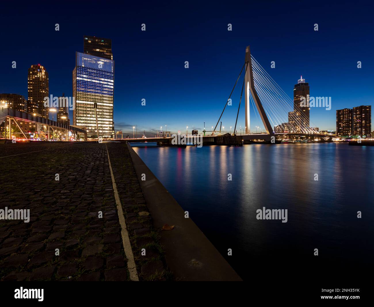 View on the Rotterdam skyline with the Erasmusbridge at night Stock ...