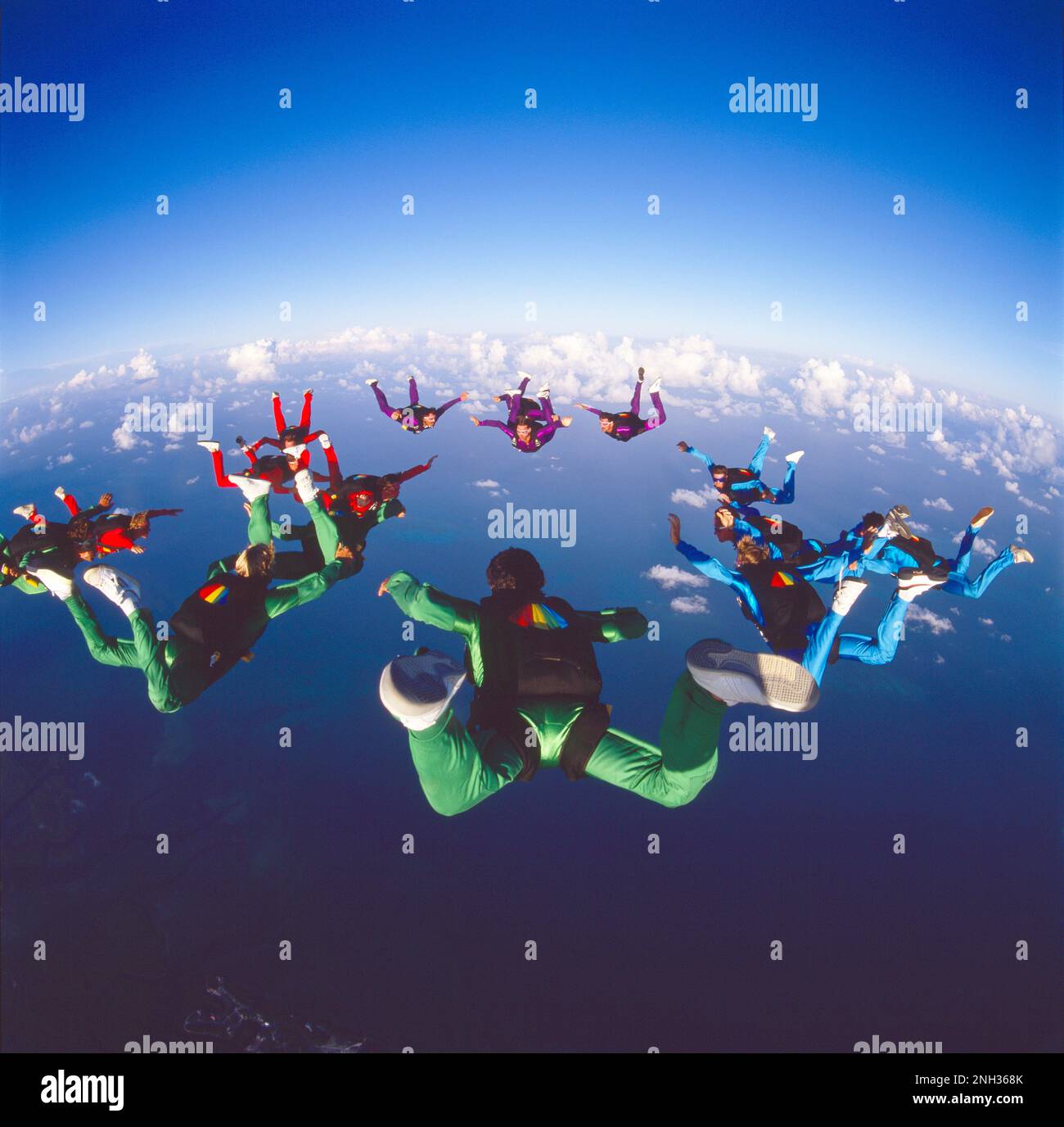 Group of skydivers in a free fall formation Stock Photo - Alamy
