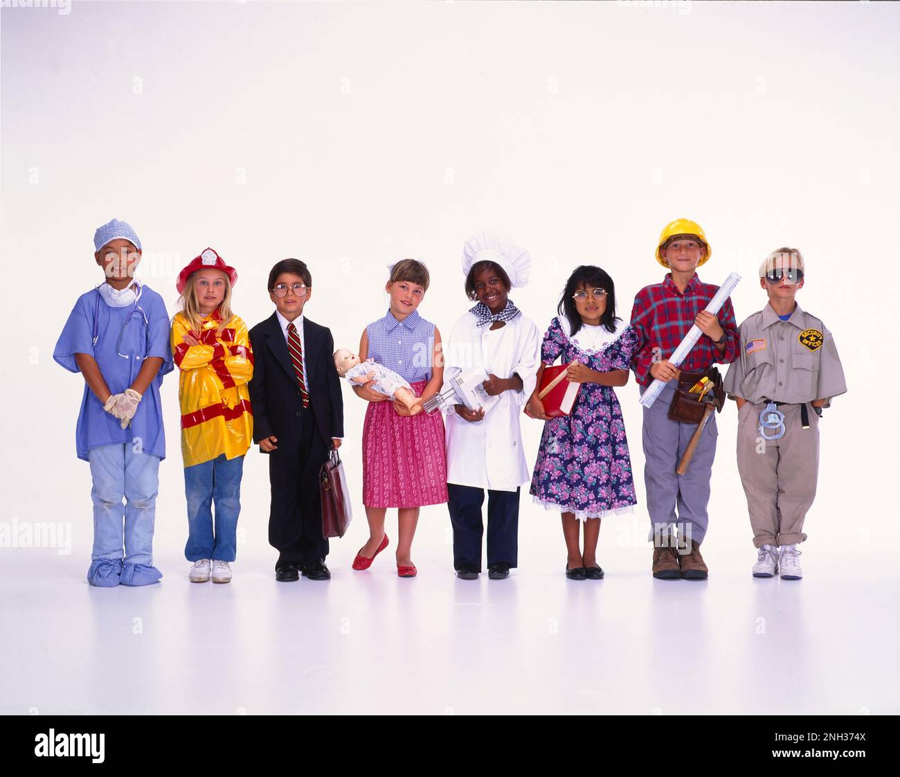 Group of children, all dressed up as different types of professionals ...