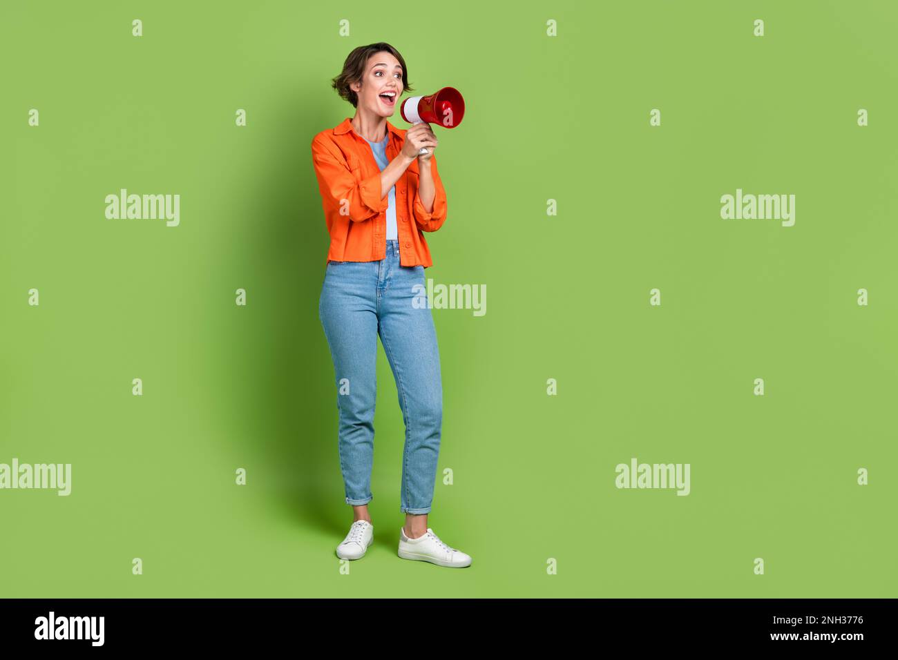 Full length photo of pretty excited woman wear denim jacket screaming ...