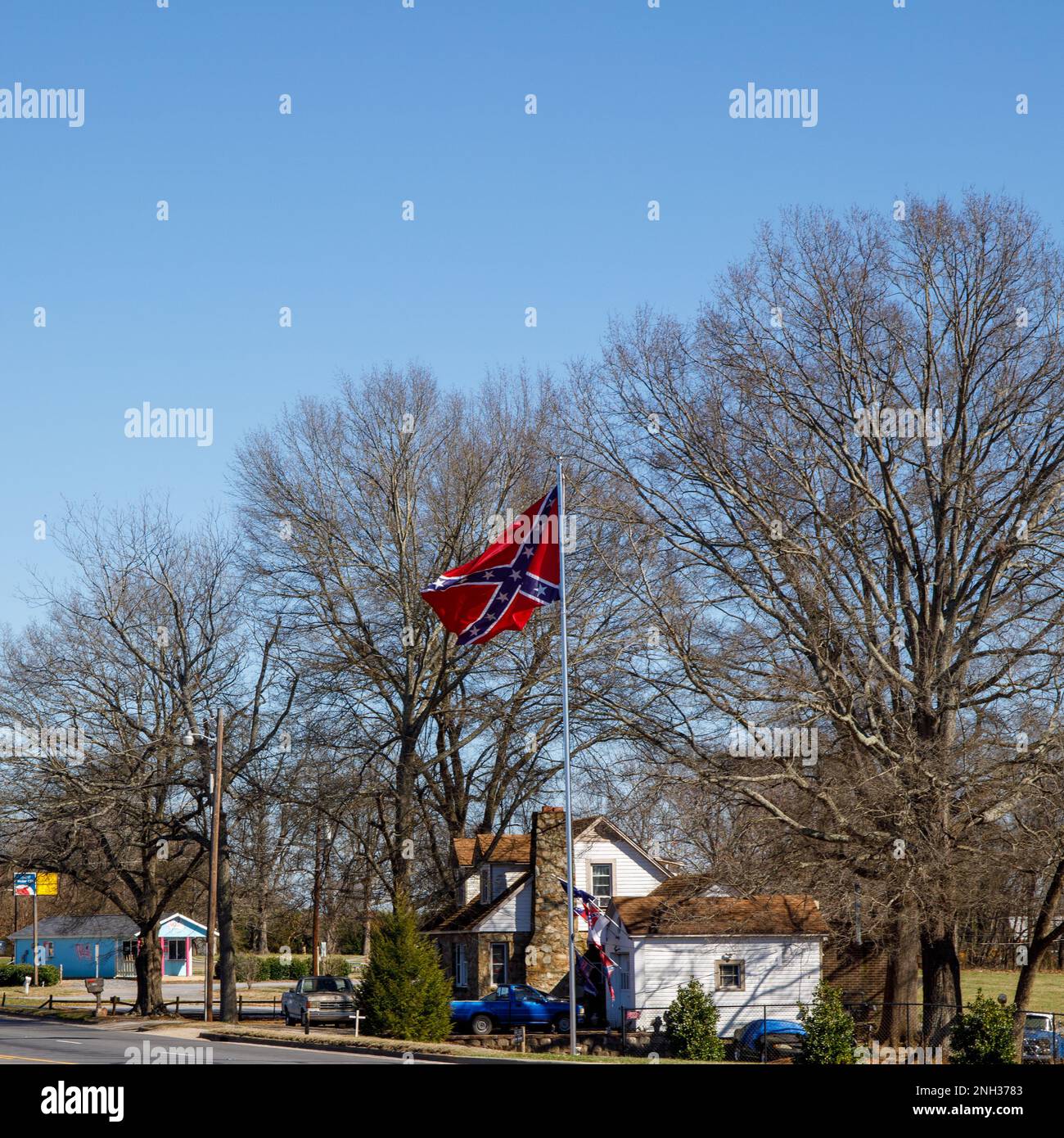 HICKORY, NC, USA-18 FEB 2023: Older rock home with large confederate ...