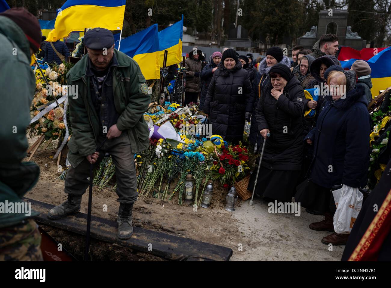 Family members attend the funeral of military serviceman Ruslan ...