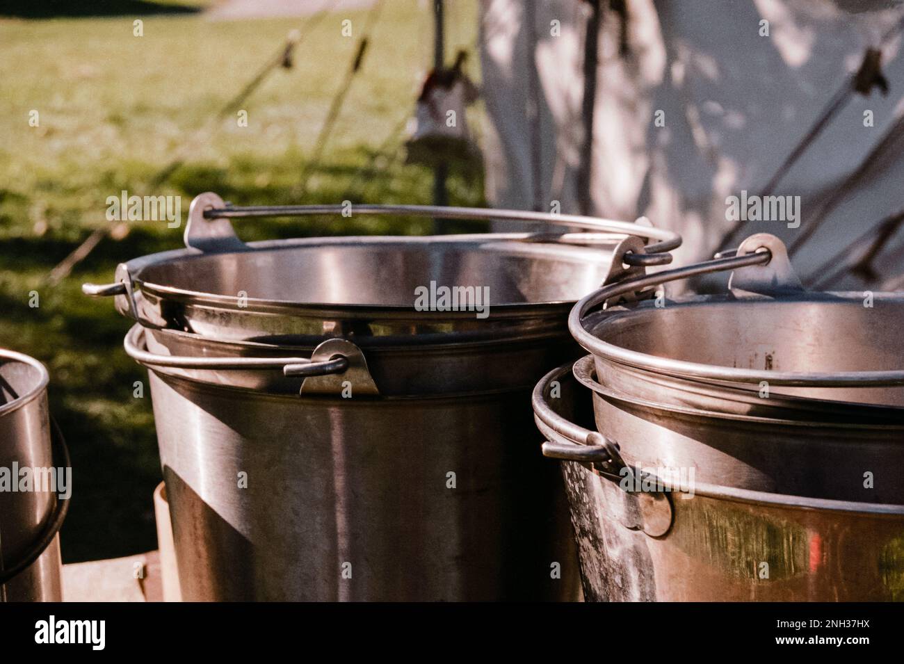 Pots and pans stacked to be cleaned at a Colonial era British camp ...