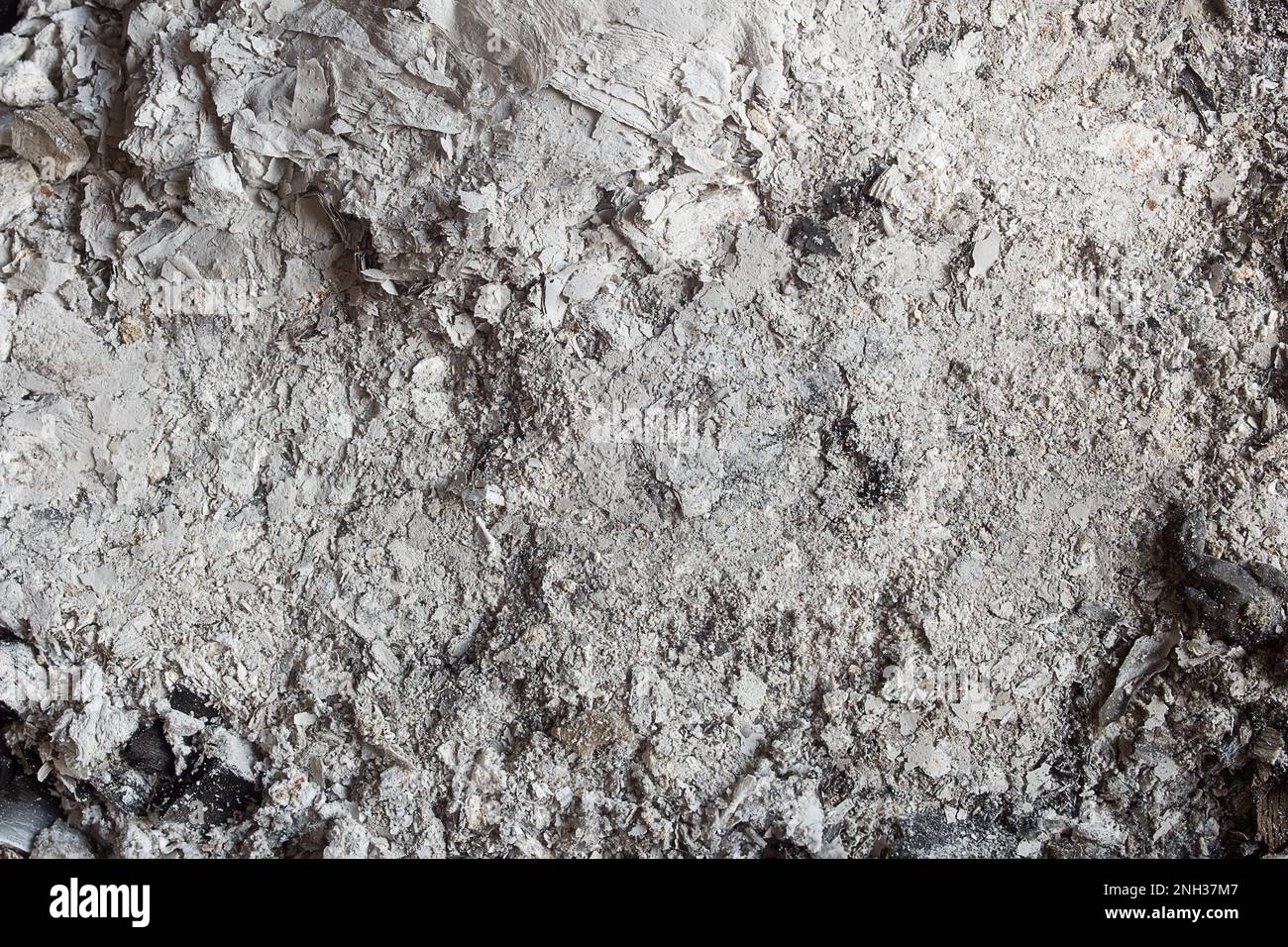 Top view of details and texture of a background of ashes in a close-up ...