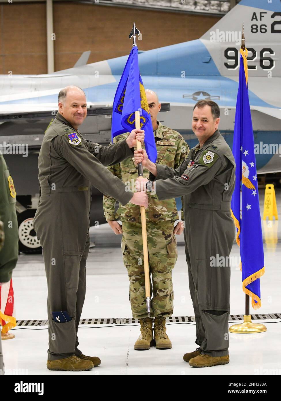 Col. Sean Rassas, 926th Wing commander, passes the guidon to Col ...