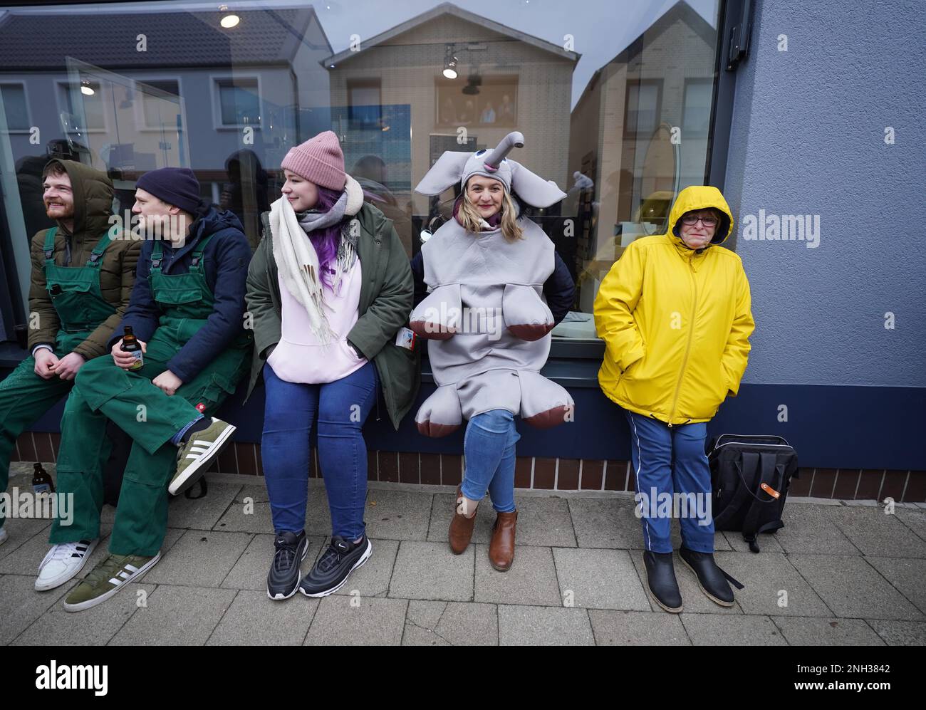 Marne, Germany. 20th Feb, 2023. A passerby dressed as an elephant ...