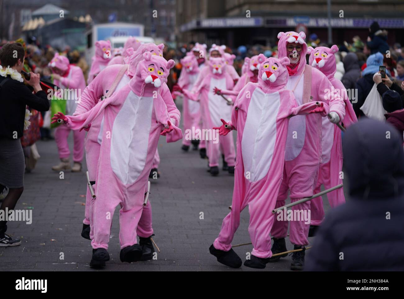 Marne, Germany. 20th Feb, 2023. Pink panthers walk through the city ...