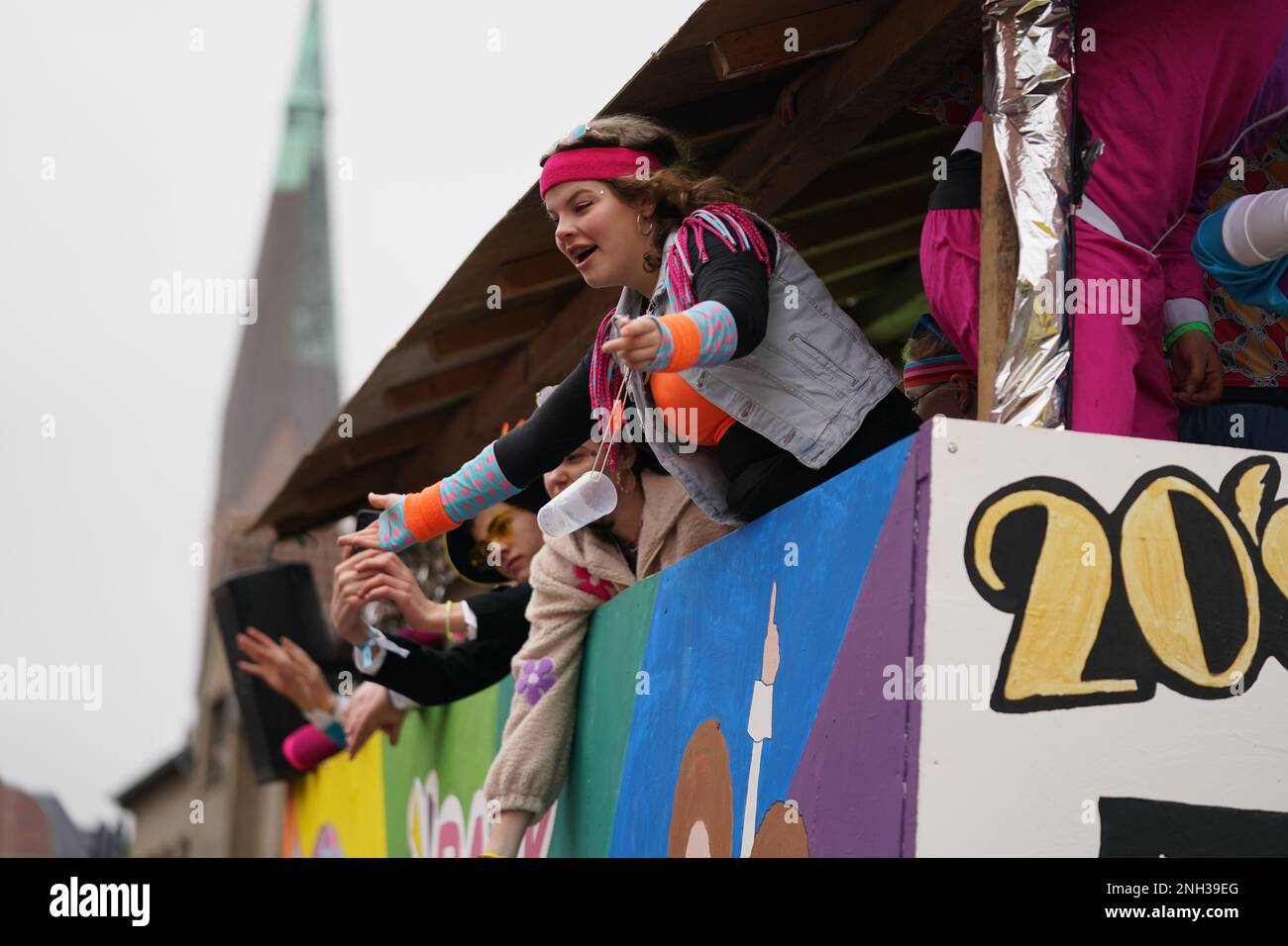 Marne, Germany. 20th Feb, 2023. Carnivalists celebrate on a float ...