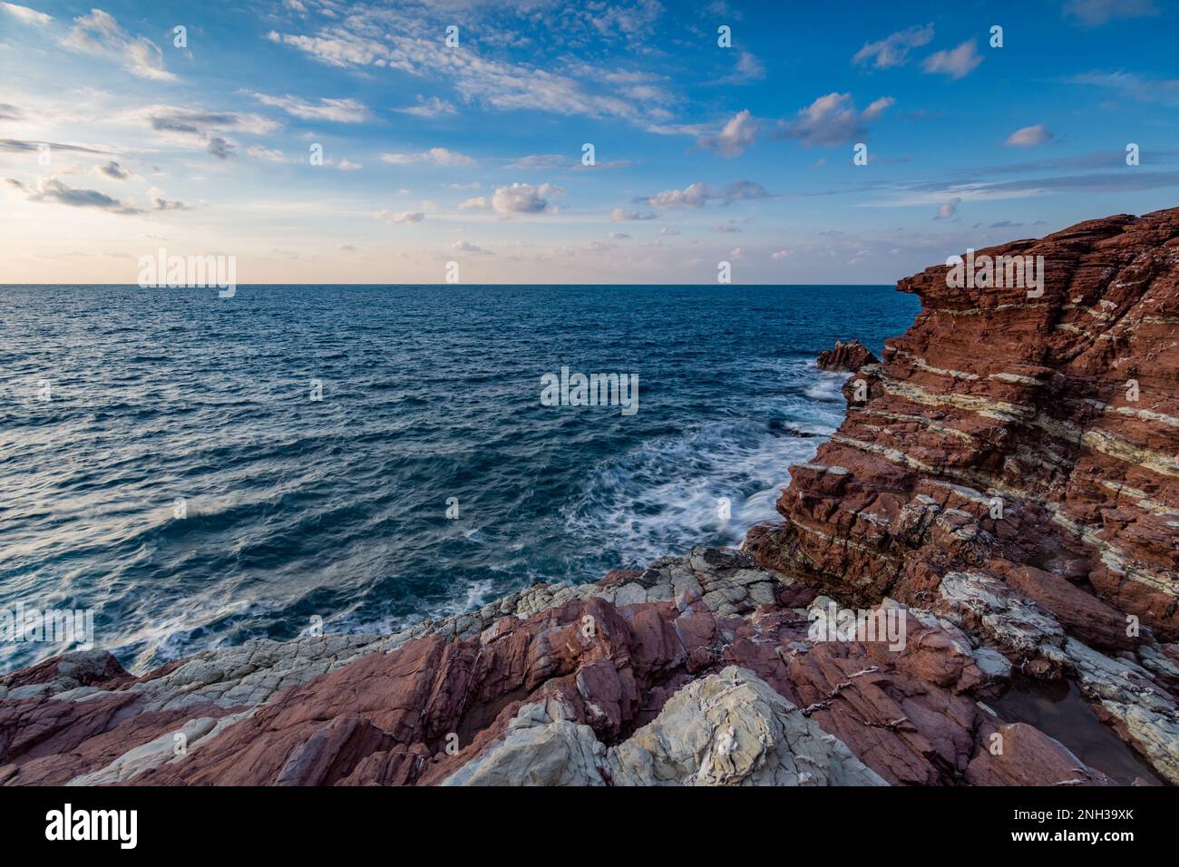Red rock cliff in Terrasini, Sicily Stock Photo - Alamy