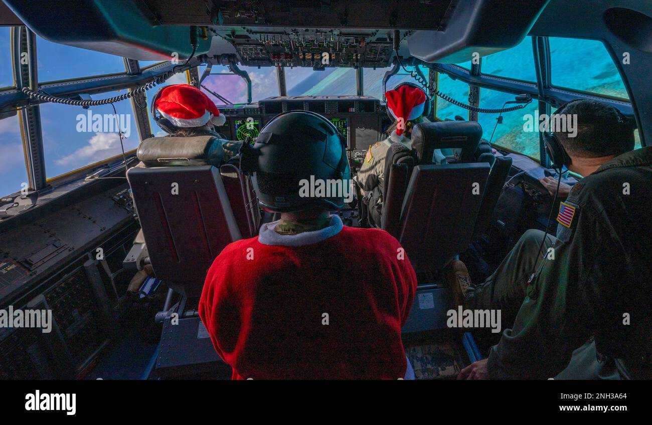 Aircrew with the 36th Expeditionary Airlift Squadron fly over Nomwin ...