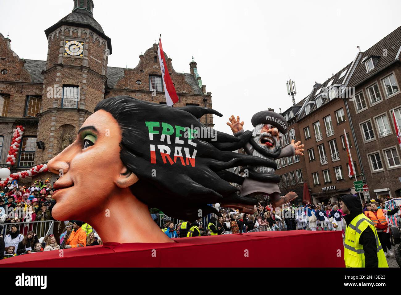 20 February 2023, Düsseldorf, Germany. Politically themed floats ...