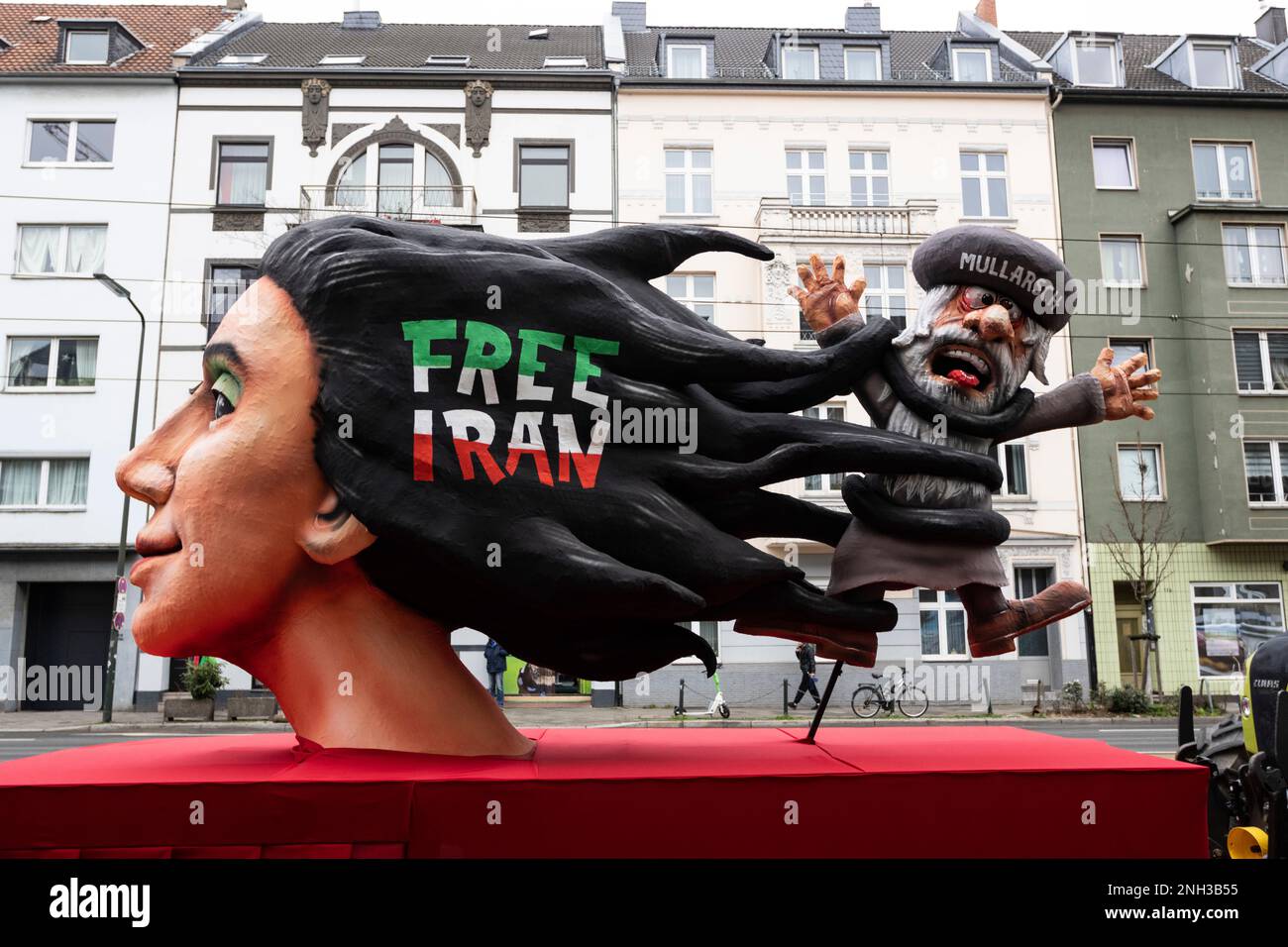 20 February 2023, Düsseldorf, Germany. Politically themed floats ...